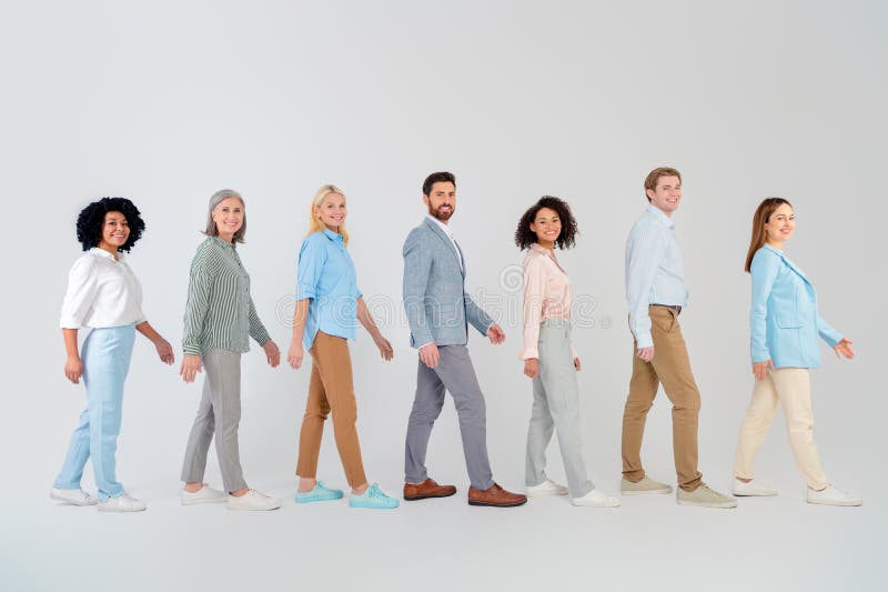 Diverse Group of Professionals Walking Together Showcasing Teamwork and ...