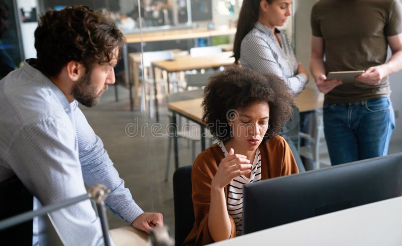 Diverse Group of Professionals Meeting in Office. it Programmers Use ...