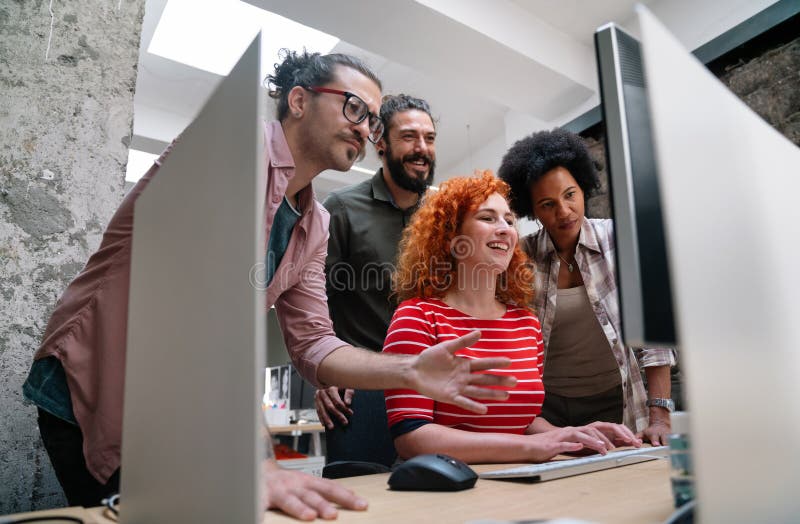 Diverse Group of Professionals Meeting in Office. it Programmers Use ...