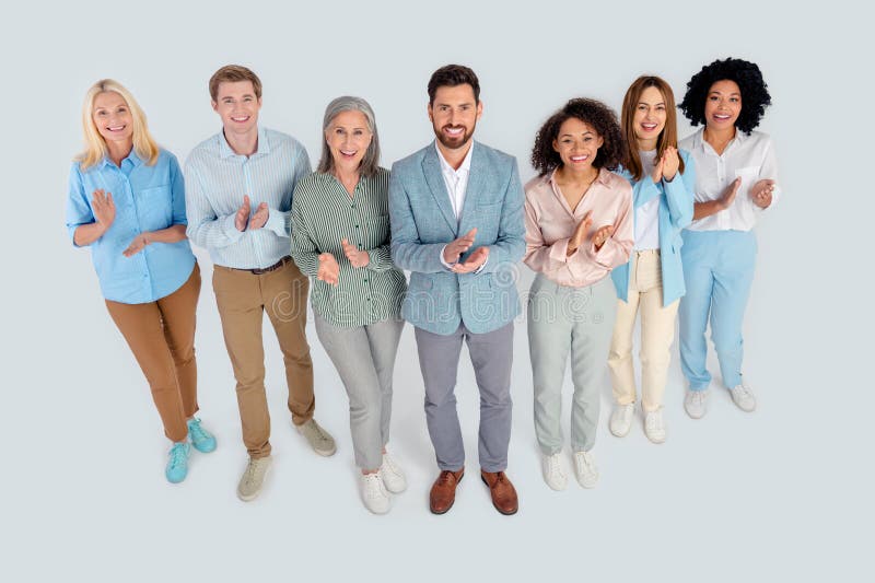Diverse Group of Professionals Standing Together and Clapping in a ...