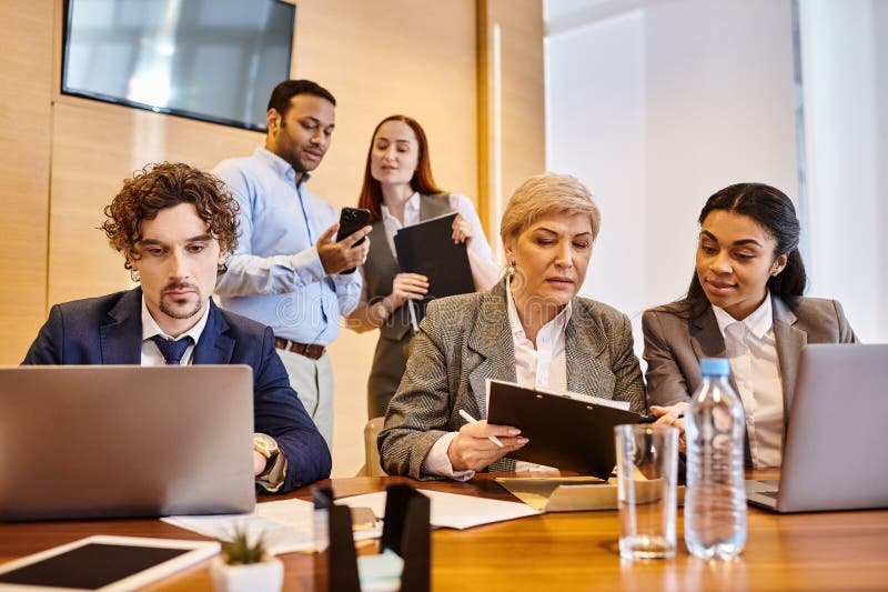 Diverse Group of Professionals Using Laptops Stock Photo - Image of ...