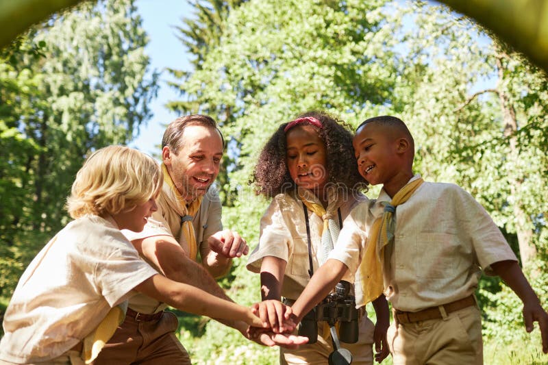 Diverse Group of Scouts Stacking Hands and Huddling Stock Image - Image ...