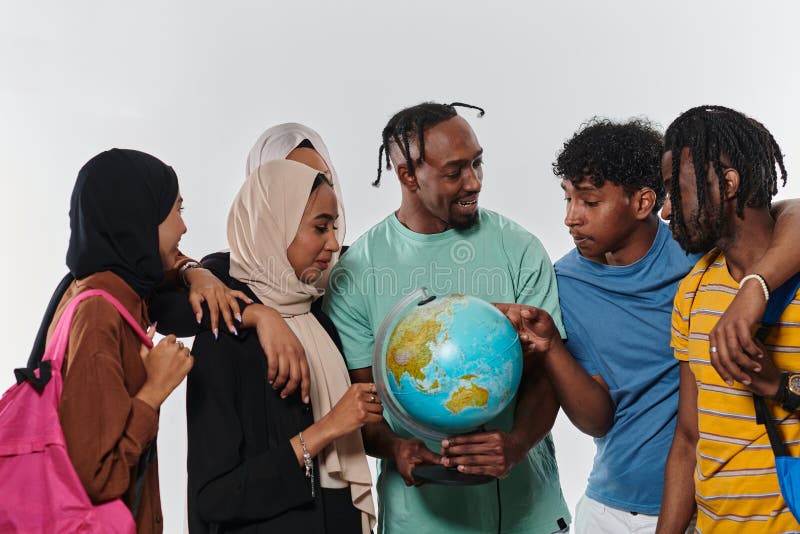 A Diverse Group of Students is Gathered Around a Globe, Engrossed in ...