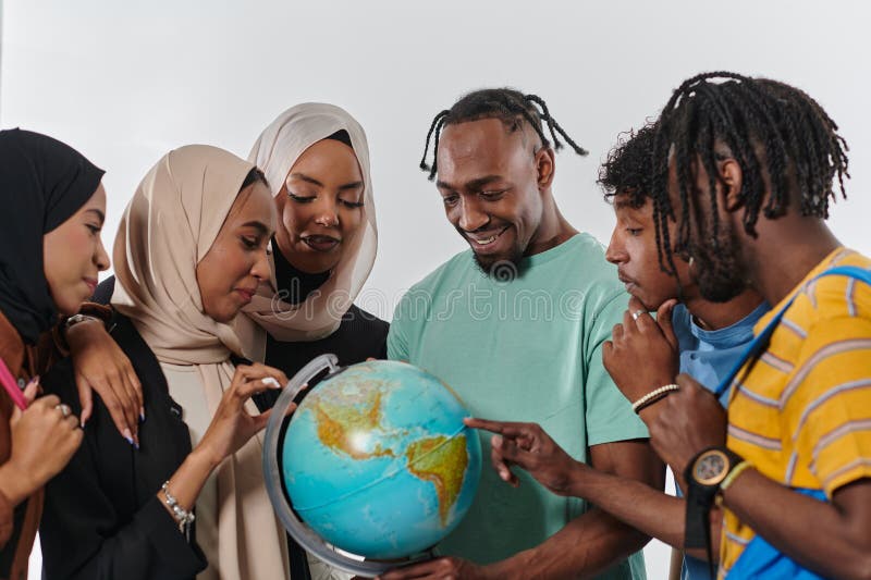 A Diverse Group of Students is Gathered Around a Globe, Engrossed in Exploration and Study ...