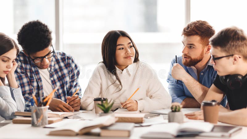 People Multiethnic Students Sitting Around a Table Stock Image - Image ...