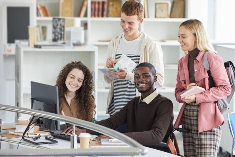 Diverse Group of Students Using Computer in School Stock Photo - Image ...