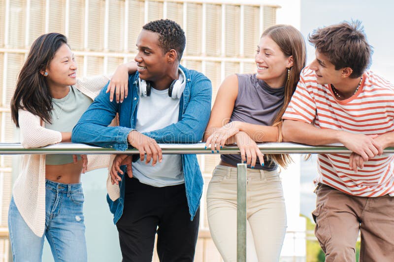 Diverse Group of Teenage Students Talking on a University Campus ...