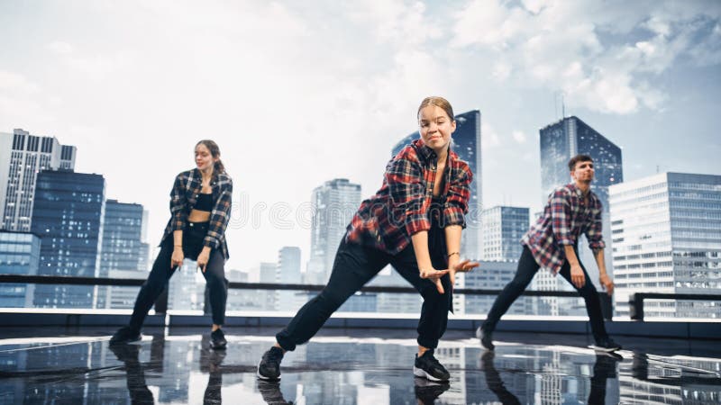 Diverse Group of Three Professional Dancers Performing a Hip Hop Dance ...