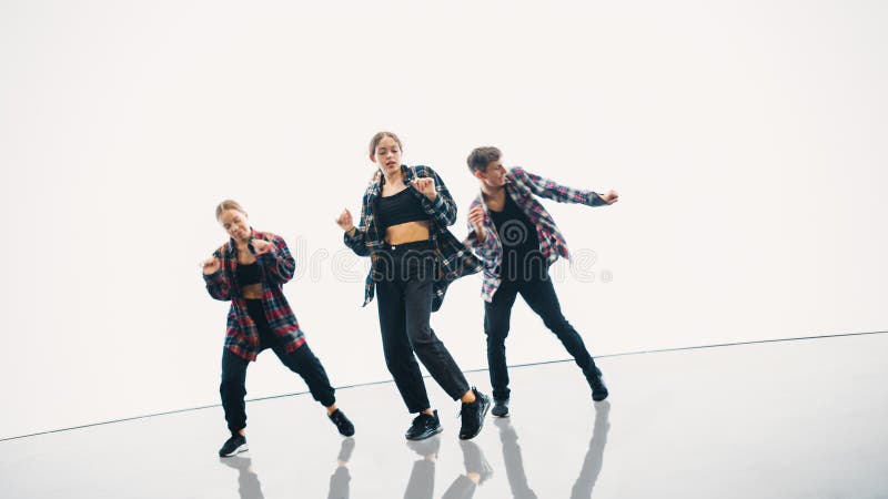 Diverse Group of Three Professional Dancers Performing a Hip Hop Dance ...