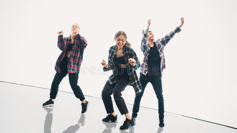 Diverse Group of Three Professional Dancers Performing a Hip Hop Dance ...