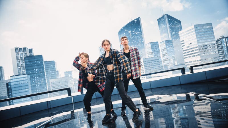 Diverse Group of Three Professional Dancers Performing a Slow ...