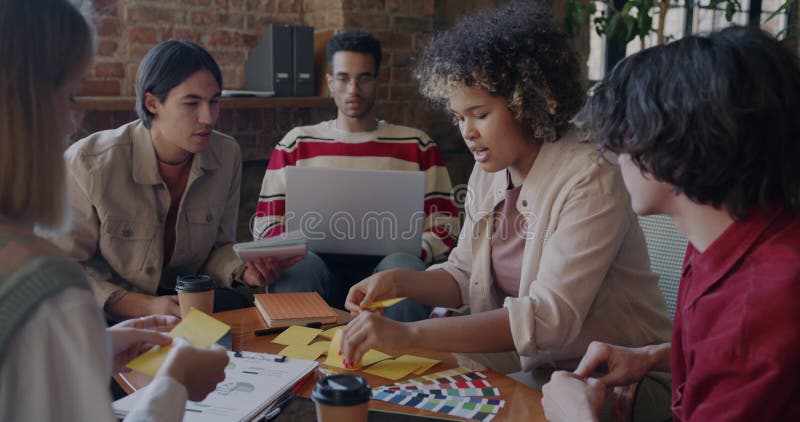 Diverse Group of Young People Employees Working with Sticky Notes ...