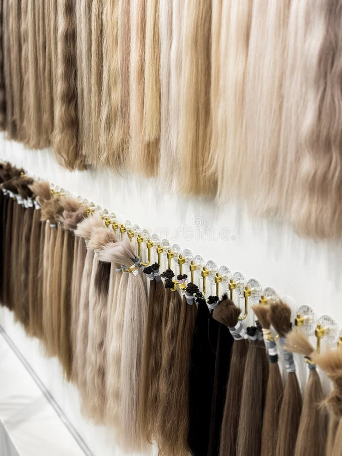 Diverse Hair Extensions Display in Soft Blonde and Brown Tones Stock ...