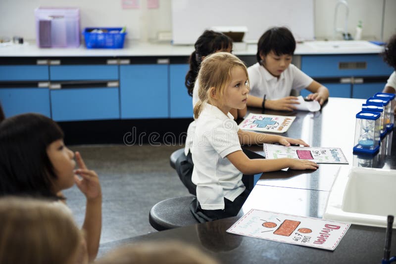 Diverse Kindergarten Students Learning Study in Classroom Stock Image ...