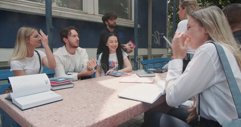 Diverse Large Group of Students Sharing Knowledge while Chatting ...