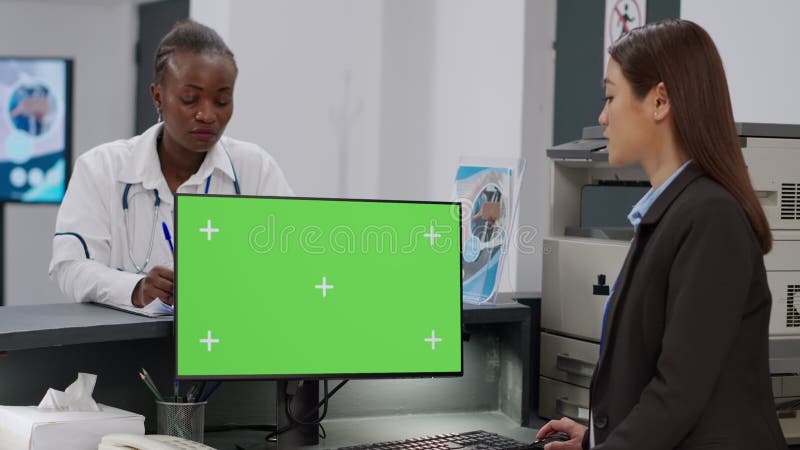 Diverse Medical Team Working at Hospital Reception Desk Stock Footage ...