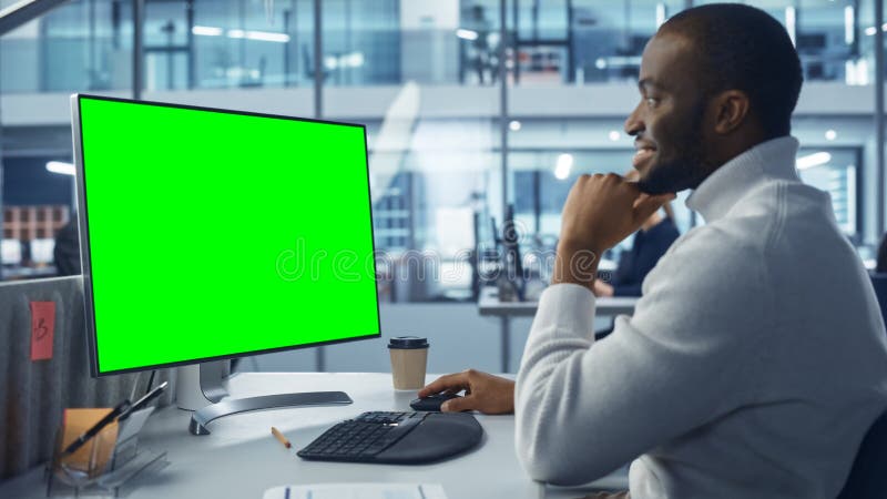 Diverse Modern Office: Handsome Black it Technician Using Desktop ...