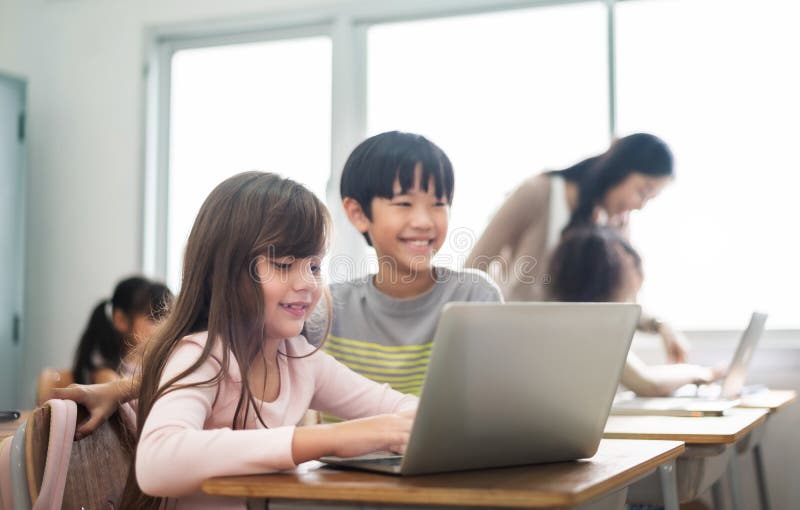 Diverse Multi Ethnic of Little Girl and Boy Using Laptops Stock Image ...