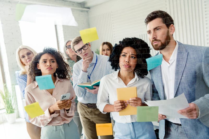 Diverse Office Team Engaged in Planning Session with Sticky Notes and ...