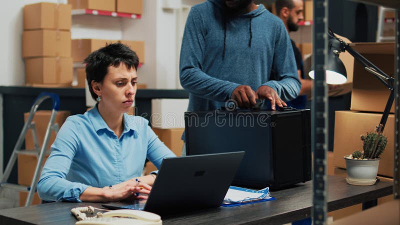 Diverse Partners Using Laptop To Do Delivery Logistics Work Stock Video ...