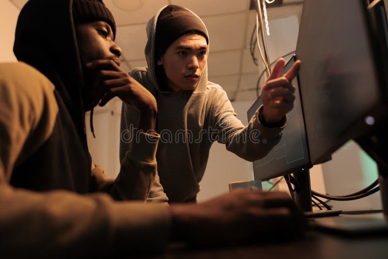 Diverse People Doing Teamwork To Break into Computer System Stock Image ...