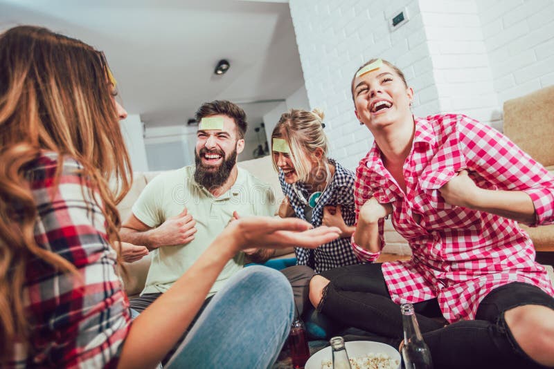 Diverse People Playing Game Guess Who and Having Fun Stock Photo ...