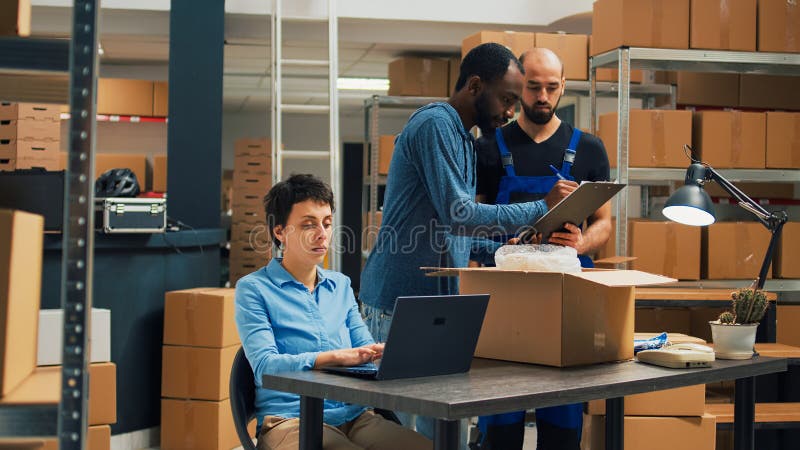 Diverse Startup Partners Doing Quality Control before Shipping Goods ...