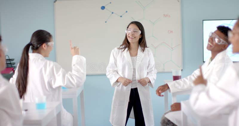 Diverse Students Engage in a Chemistry Experiment at High School ...