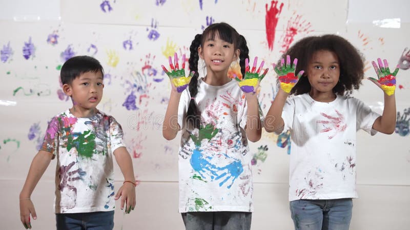 Diverse Students Put Hands Up Together Show Colourful Stained Hands ...
