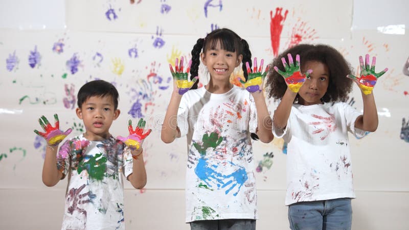 Diverse Students Put Hands Up Together Show Colorful Stained Hands ...