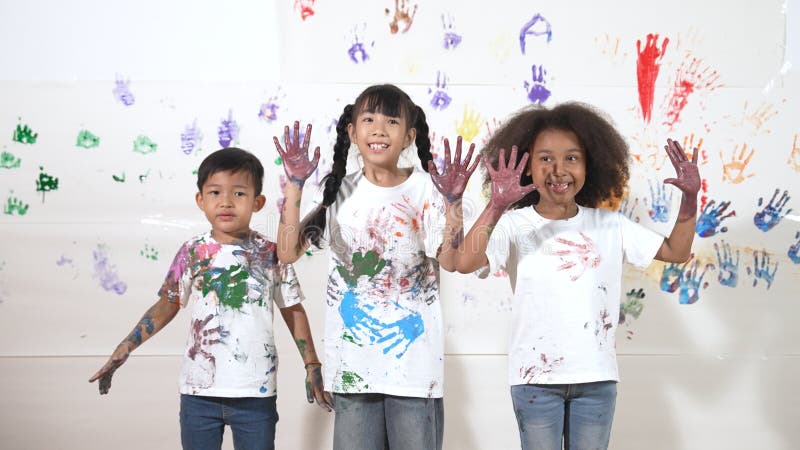 Diverse Students Put Hands Up Together Show Colorful Stained Hands ...