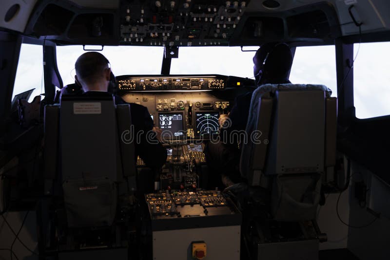 Diverse Team of Aircrew Members Using Control Command To Fly Plane ...