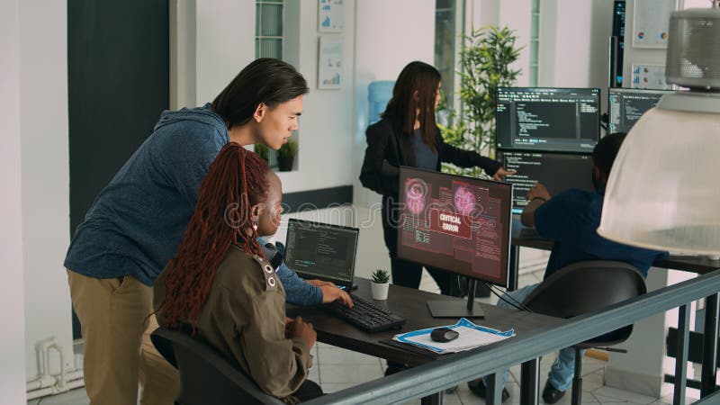 Diverse Team of App Developers Having Computer Hacked and Writing Code Stock Photo - Image of ...
