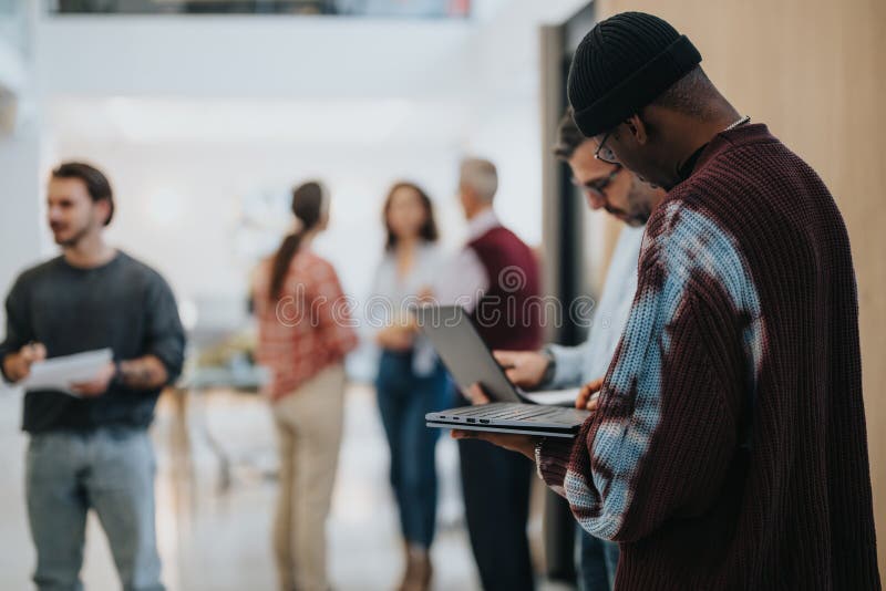 Diverse Team of Business Colleagues Working Together in a Modern Office ...
