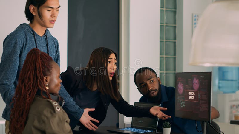 Diverse Team of Coders Dealing with Security Breach Alert on Computer Stock Photo - Image of ...