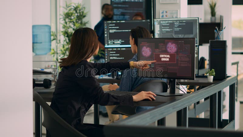 Diverse Team of Coders Having Server Hacked and System Crash Stock ... Diverse Team of Coders Having Server Hacked and System Crash Stock ...