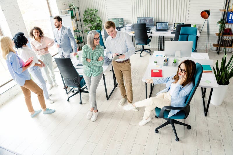 Diverse Team Collaborating in a Bright and Modern Office Workspace ...