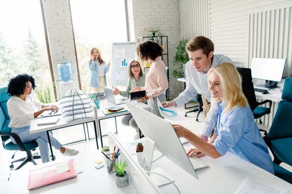 Diverse Team Collaborating in Modern Office Environment, Multi-age ...