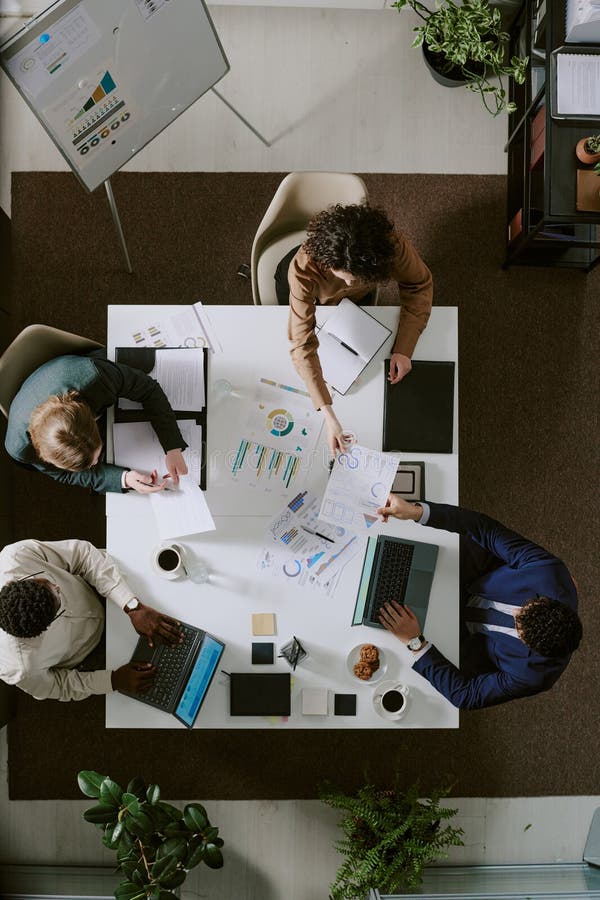 Diverse Team Collaborating in Modern Office Environment Stock Photo ...