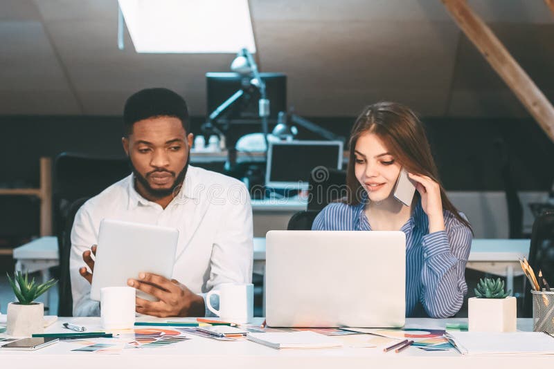 Diverse Team Collaborating in a Modern Office Loft on a Bright Day ...