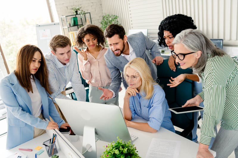 Diverse Team Collaborating on a Project in a Modern Office Setting ...