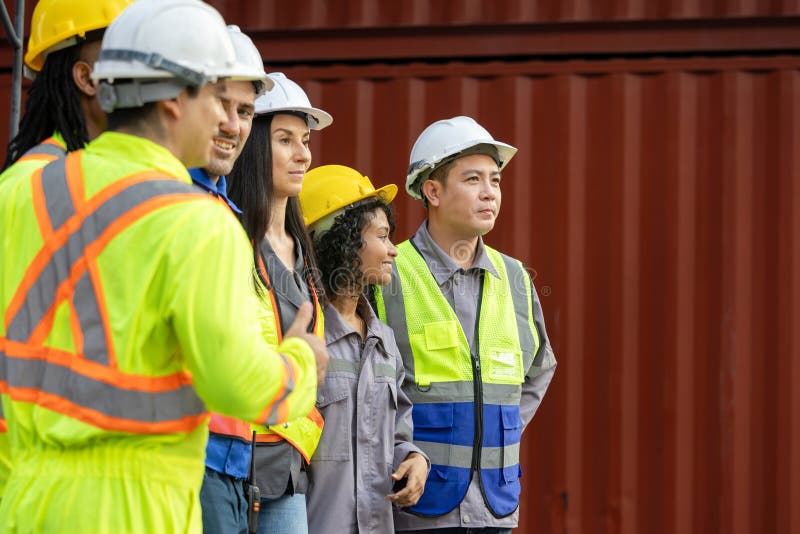 Diverse Team of Construction Workers and Engineers at a Job Site, Group ...