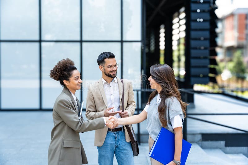 Diverse Team of Corporate Professionals in Formal Attire Collaborating ...
