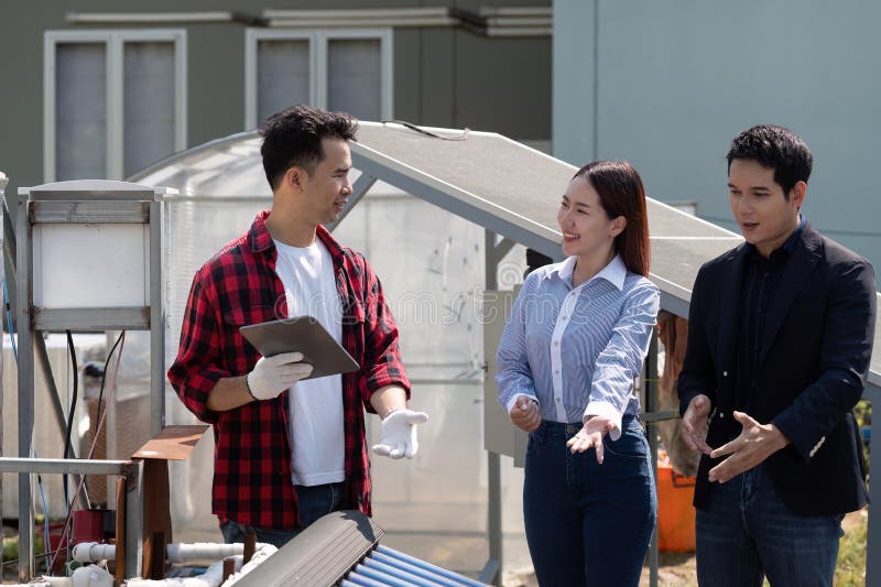 Sustainable Collaboration. a Group Discussing Eco-friendly Solutions in ...