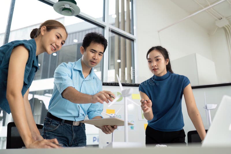 Innovative Sustainability Meeting. Team Discussing Renewable Energy in ...