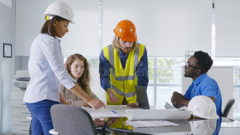 Diverse Team of Engineers and Architects Discussing Construction and ...