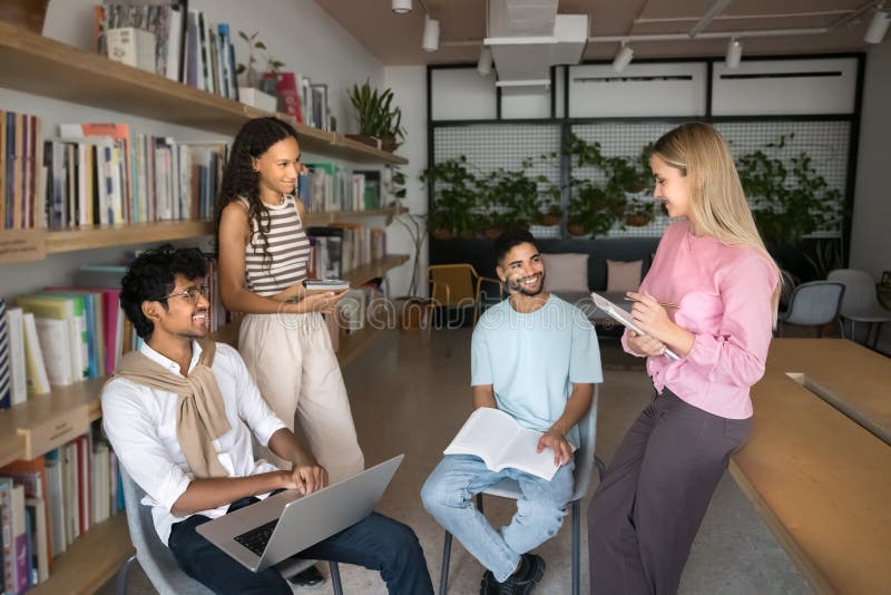 Diverse Team of Fresh Student Friends Meeting in College Library Stock ...