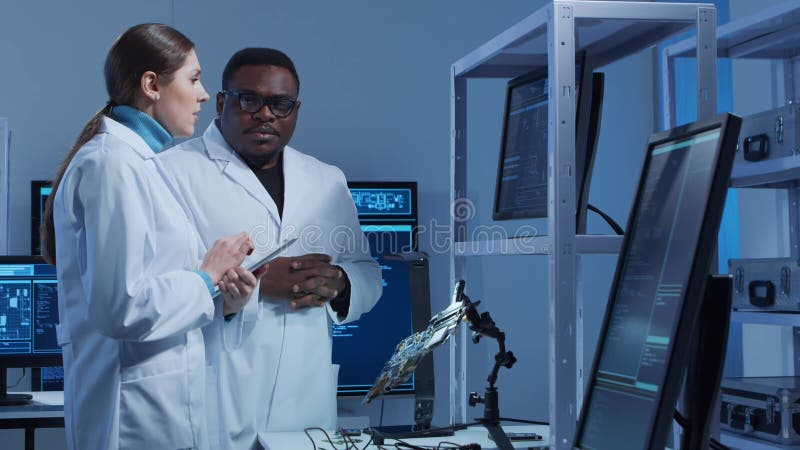 Diverse Team of Microelectronic Engineers Discuss Current Developments ...