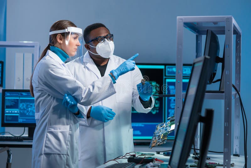 Diverse Team of Microelectronic Engineers Discuss Current Developments ...