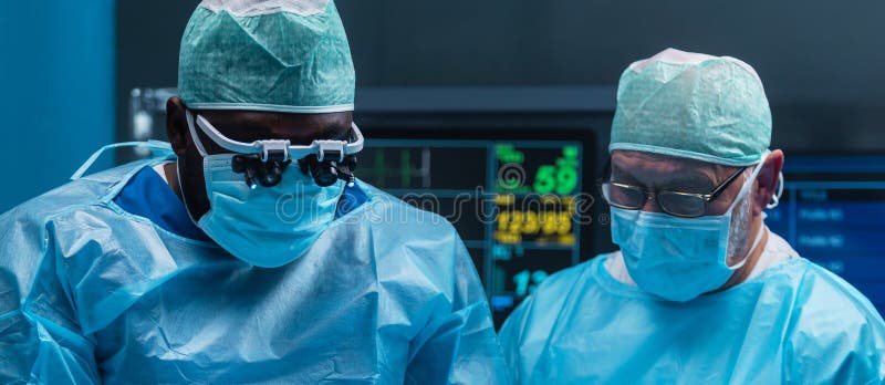Team of Medical Doctors Performs Surgical Operation in Modern Operating ...